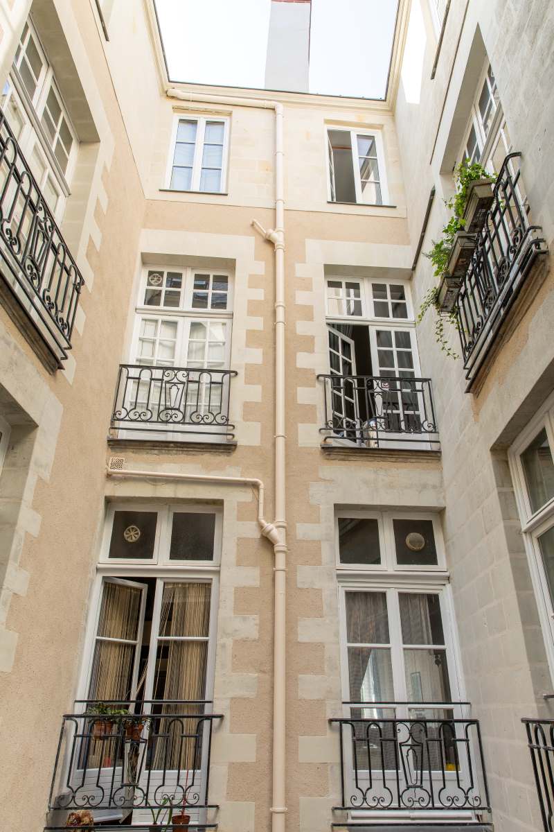 Projet de restauration de façades sur cour par Mervane Architectes